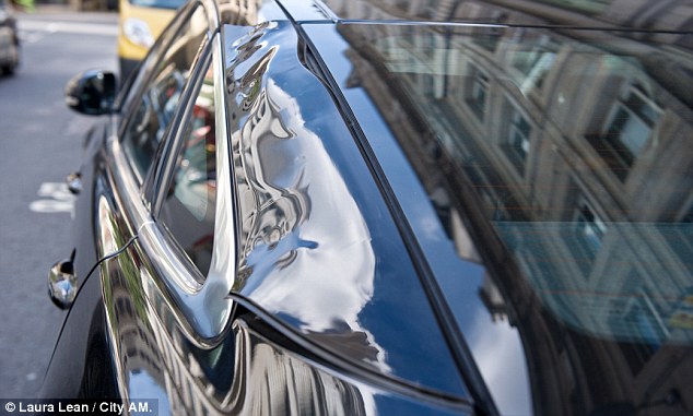 Video: Watch how a building melted this parked Jaguar XJ | Motoroids