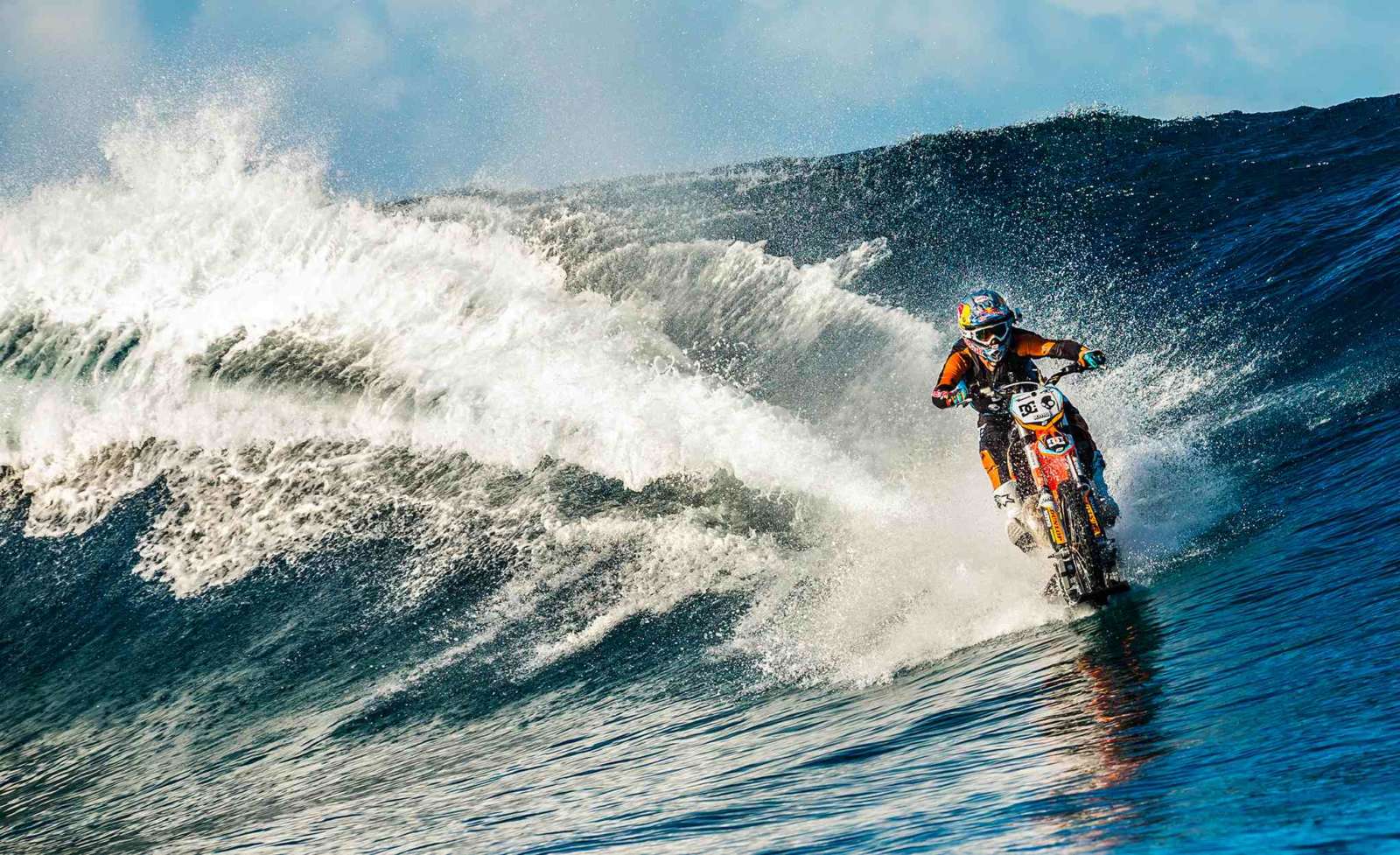 Here’s an insane video of Robbie Maddison surfing a wave on a KTM dirt ...