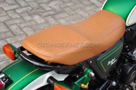This fabulous looking retro-styled cafe racer is a Pulsar 220F under ...